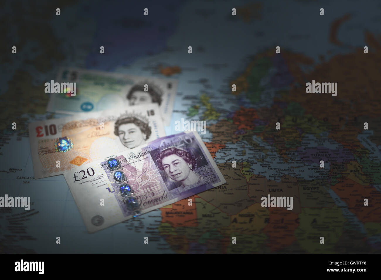 Pounds on world map Stock Photo - Alamy