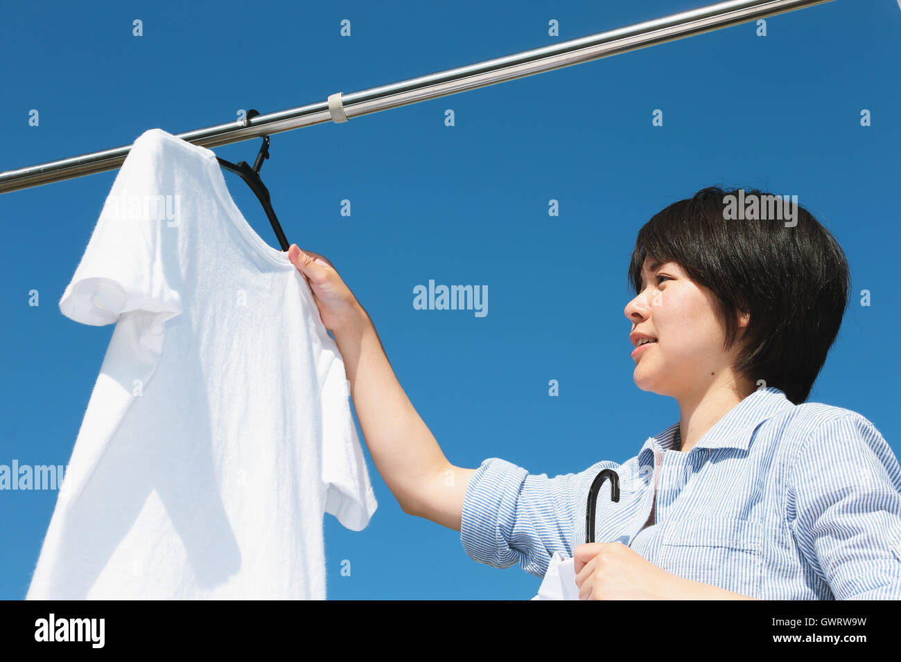 Japanese woman doing housework hi-res stock photography and images - Alamy