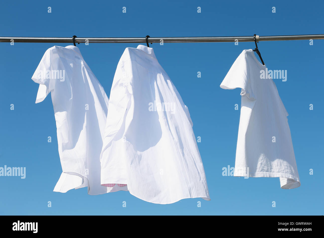 Washed clothes under the sun Stock Photo - Alamy