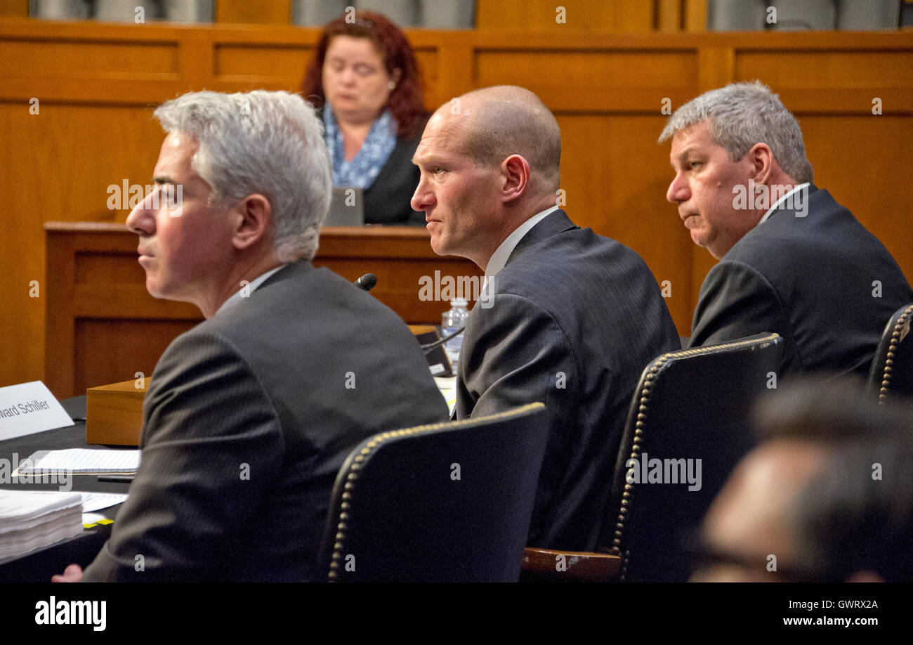 From right to left: J. Michael Pearson, Chief Executive Officer ...