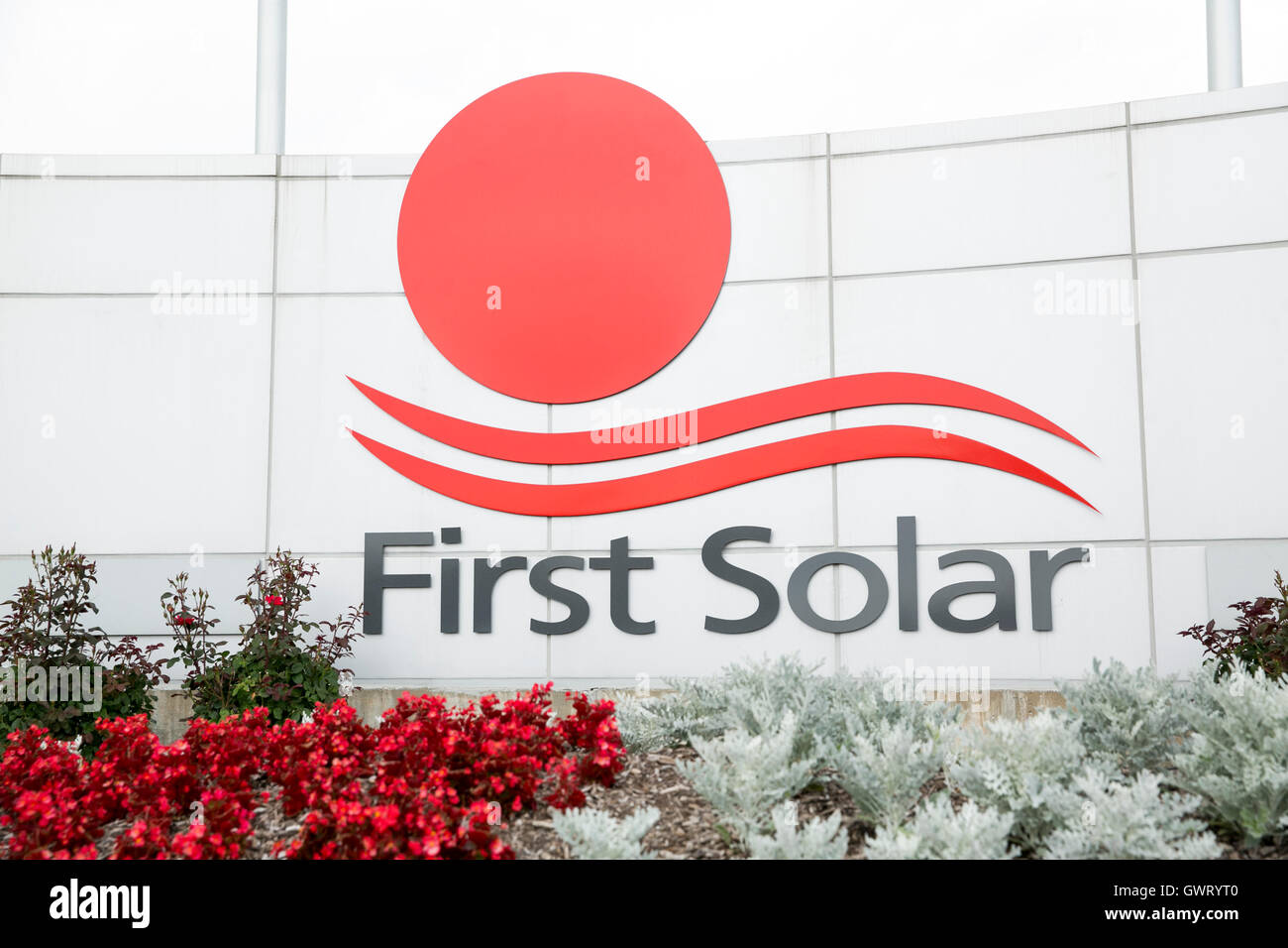 A logo sign outside of a facility occupied by First Solar in Perrysburg ...