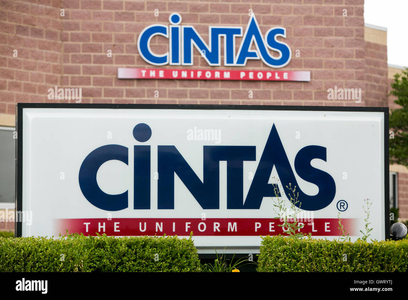 A logo sign outside of a facility occupied by the Cintas Corporation in ...