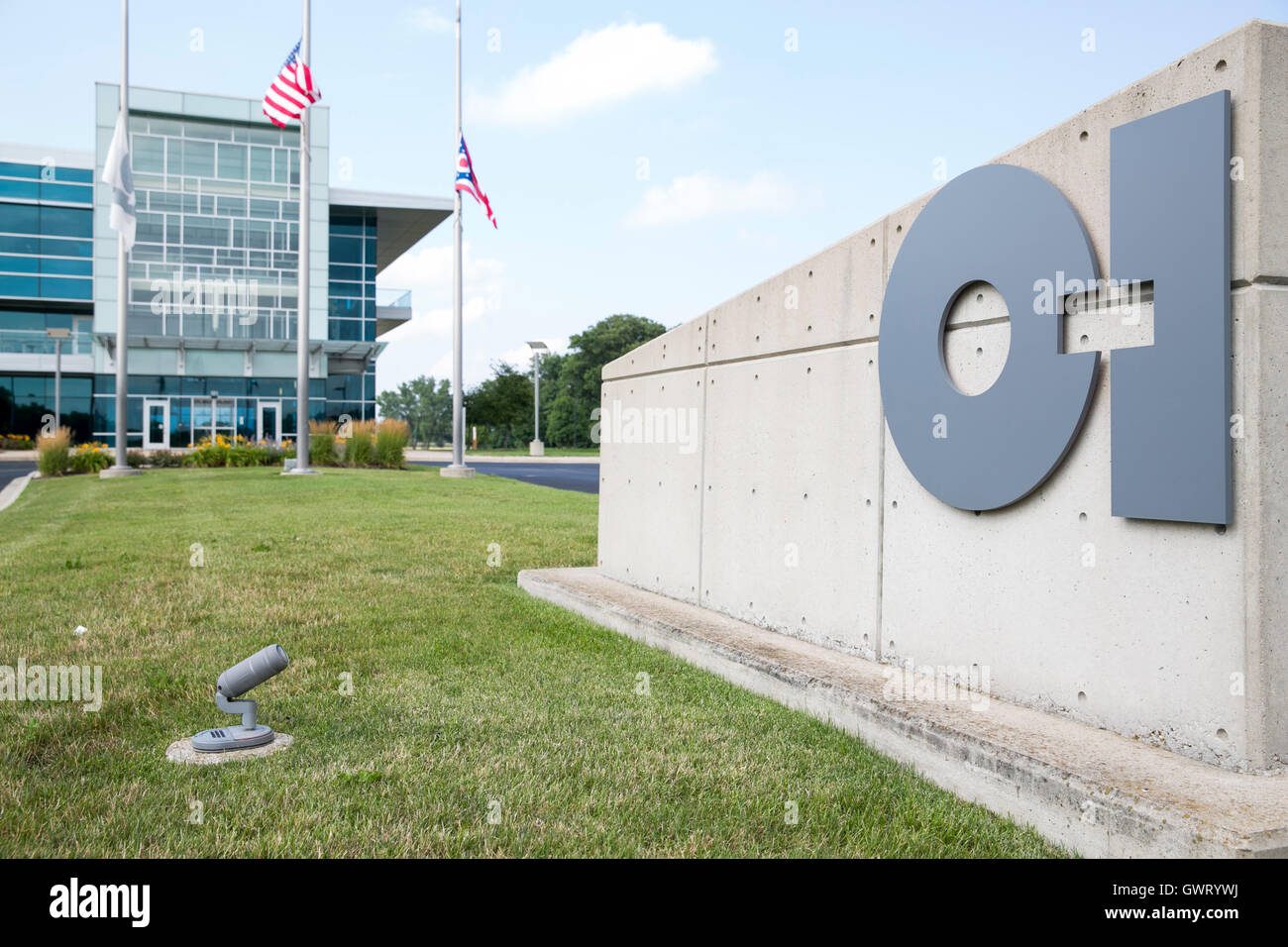 A logo sign outside of the headquarters of Owens-Illinois, Inc., in ...