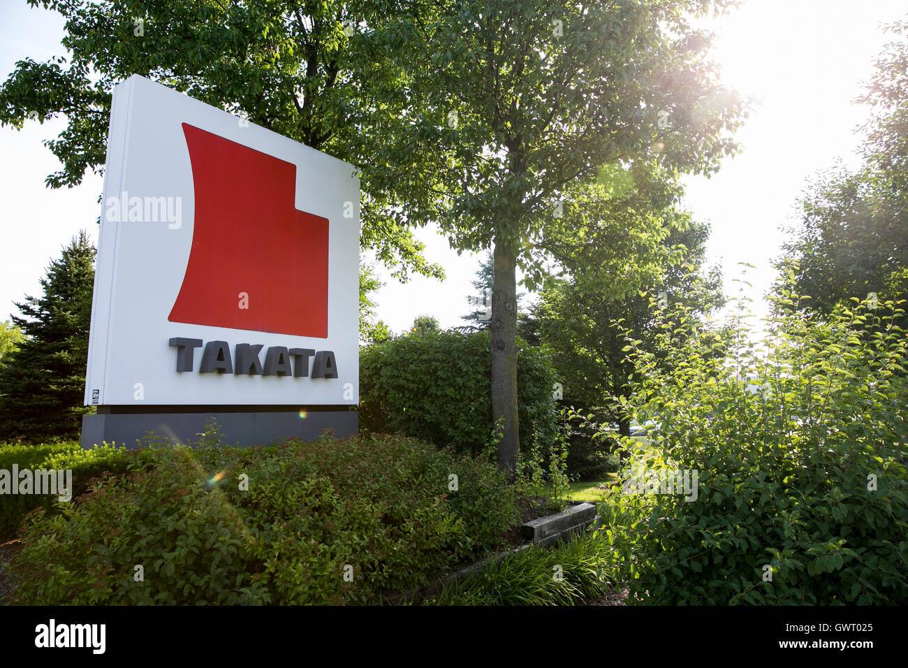 A logo sign outside of a facility occupied by the Takata Corporation in ...