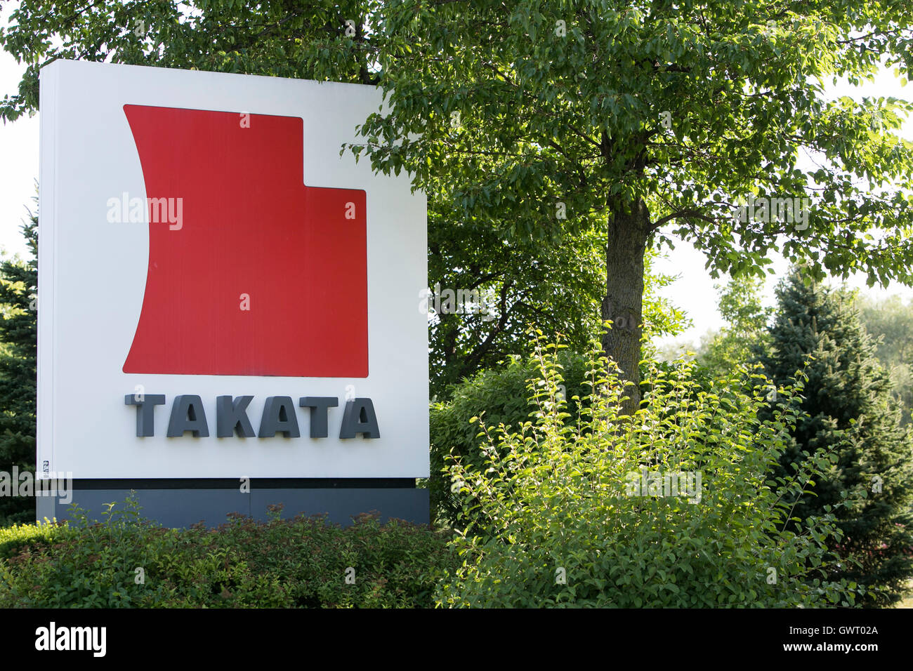A logo sign outside of a facility occupied by the Takata Corporation in ...