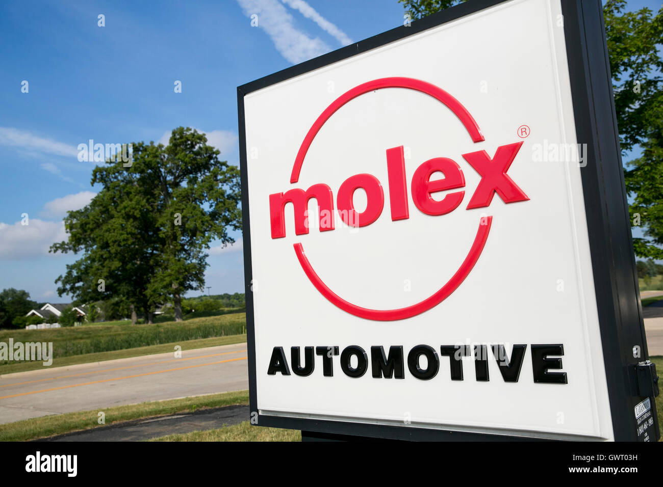 A logo sign outside of facility occupied by Molex Inc., in Auburn Hills ...