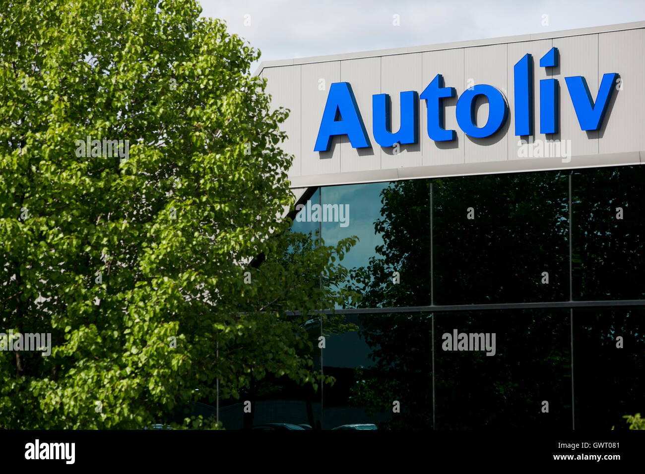 A logo sign outside of a facility occupied by Autoliv in Auburn Hills ...
