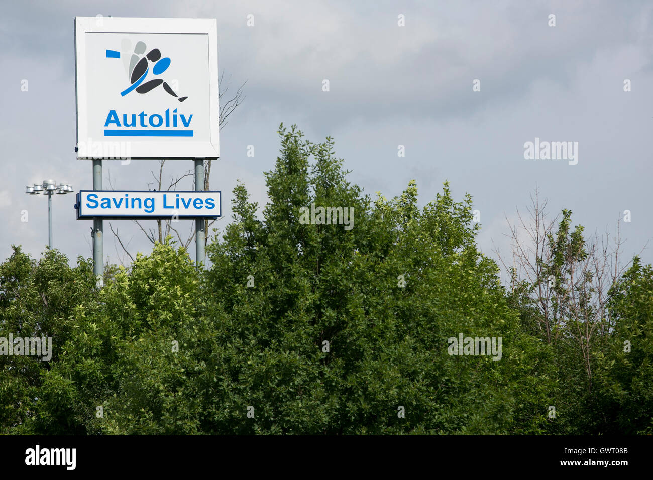 A logo sign outside of a facility occupied by Autoliv in Auburn Hills ...