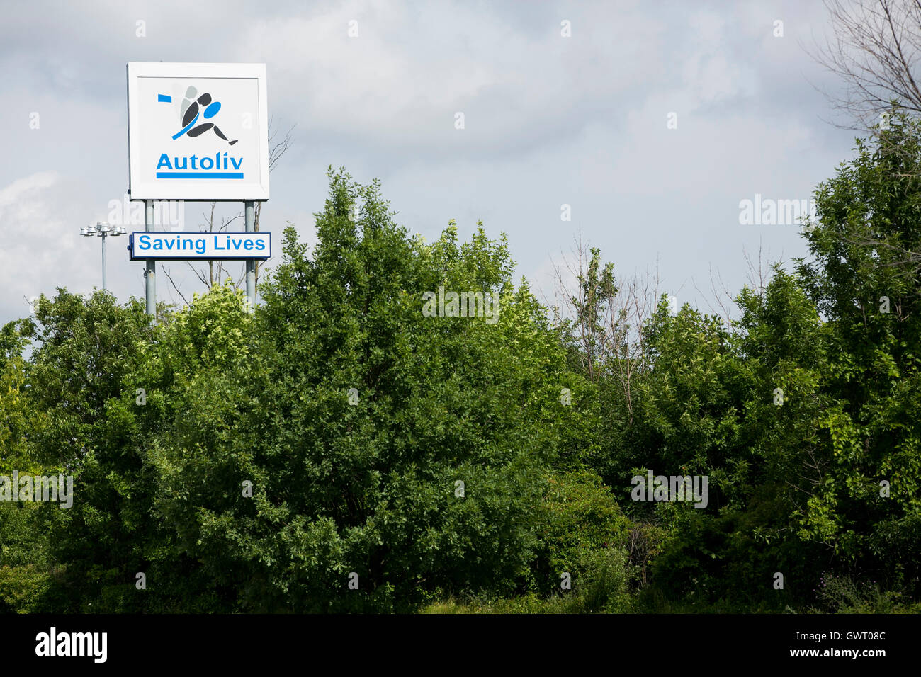 A logo sign outside of a facility occupied by Autoliv in Auburn Hills ...