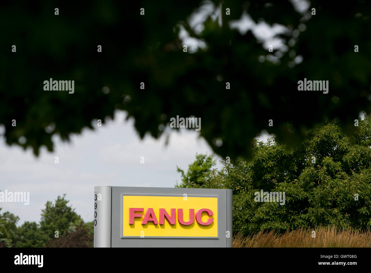 A logo sign outside of a facility occupied by the Fanuc America ...