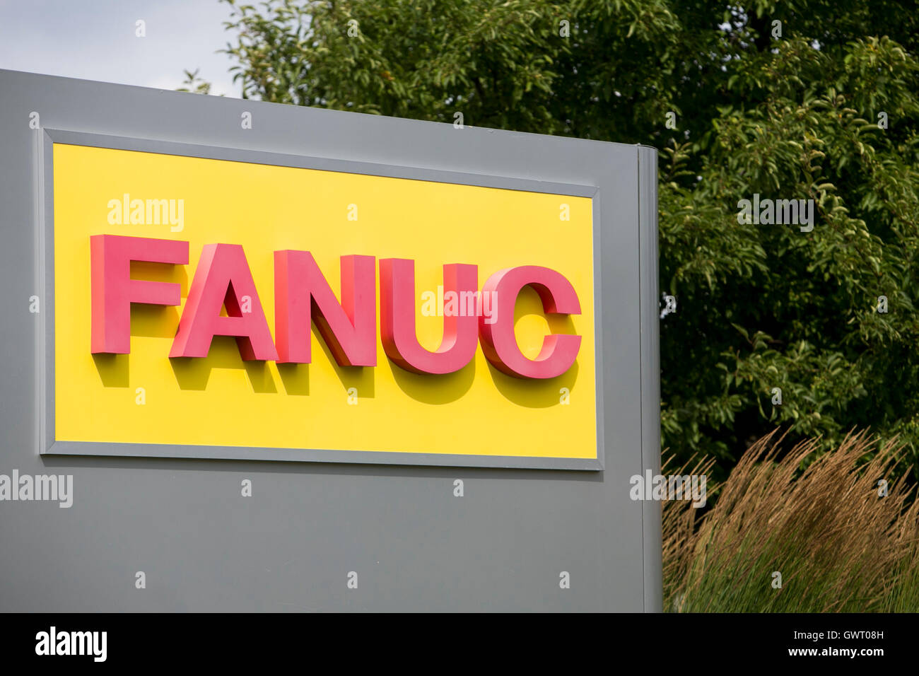 A logo sign outside of a facility occupied by the Fanuc America ...