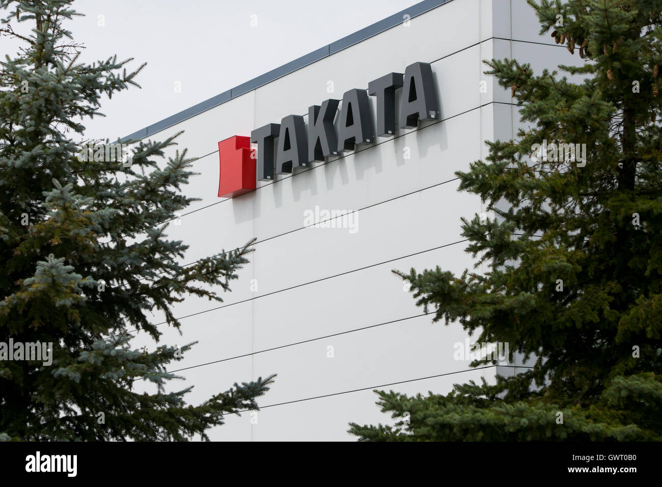 A logo sign outside of a facility occupied by the Takata Corporation in Pontiac, Michigan on ...