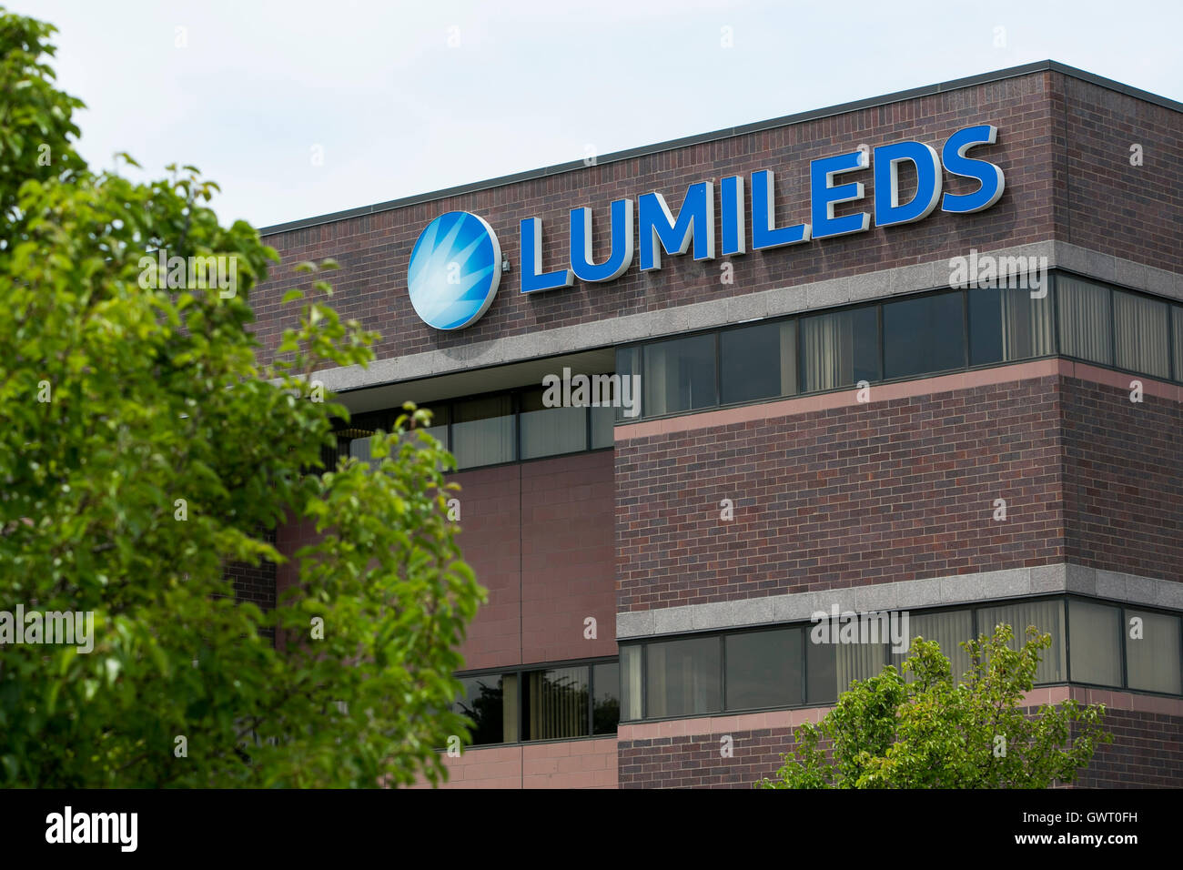 A logo sign outside of a facility occupied by Lumileds Lighting in ...