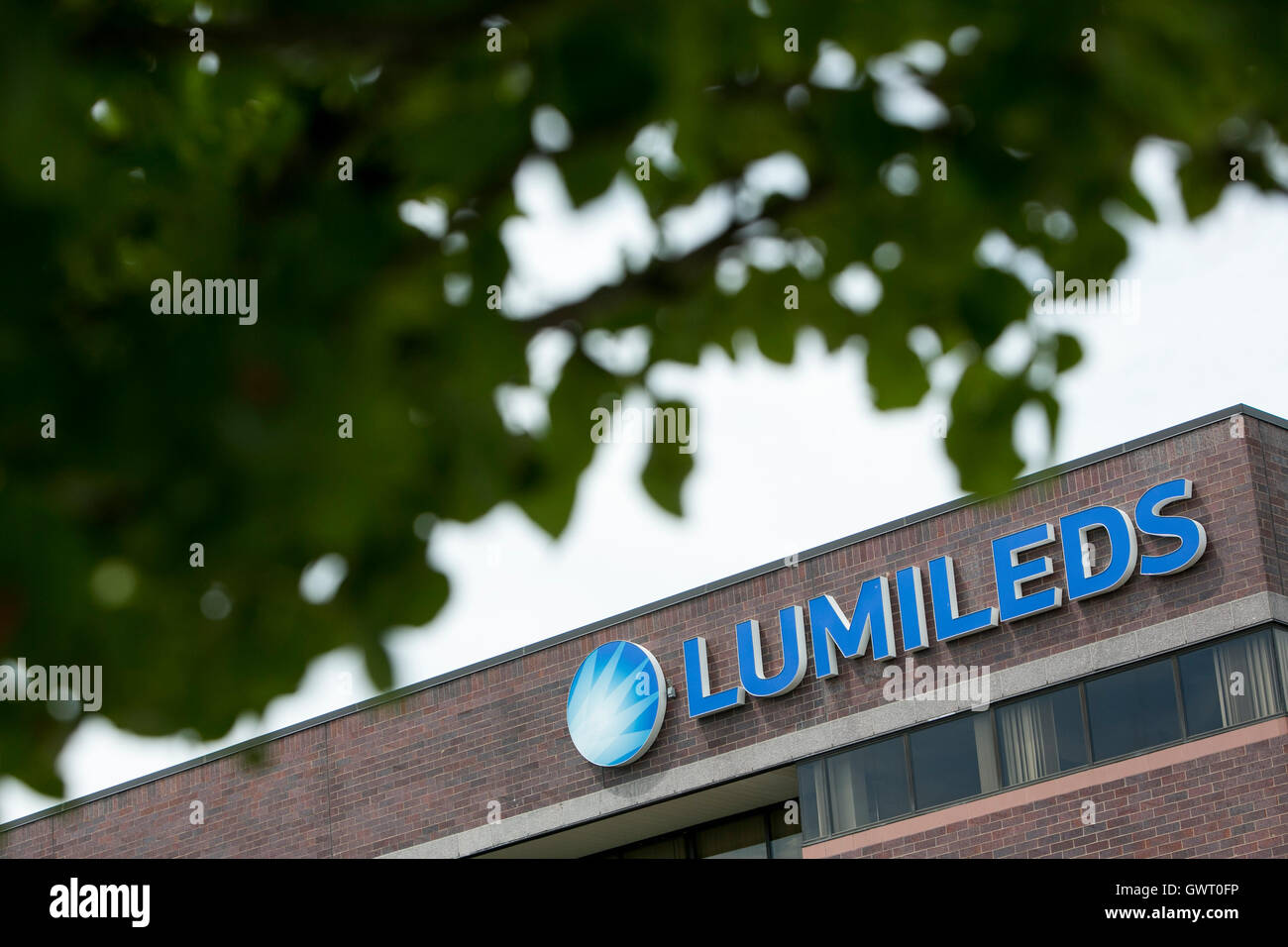 A logo sign outside of a facility occupied by Lumileds Lighting in ...