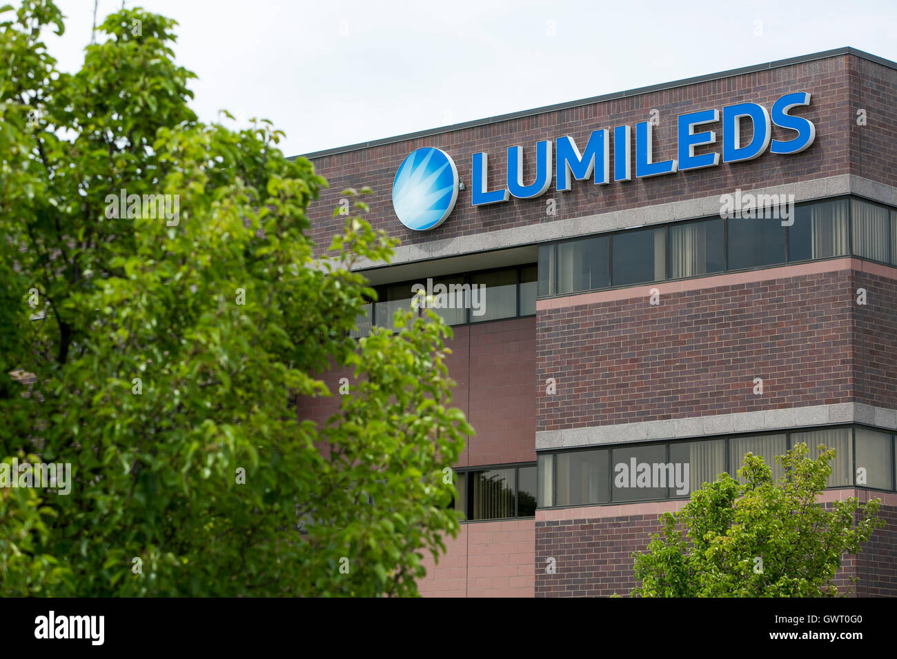 A logo sign outside of a facility occupied by Lumileds Lighting in ...