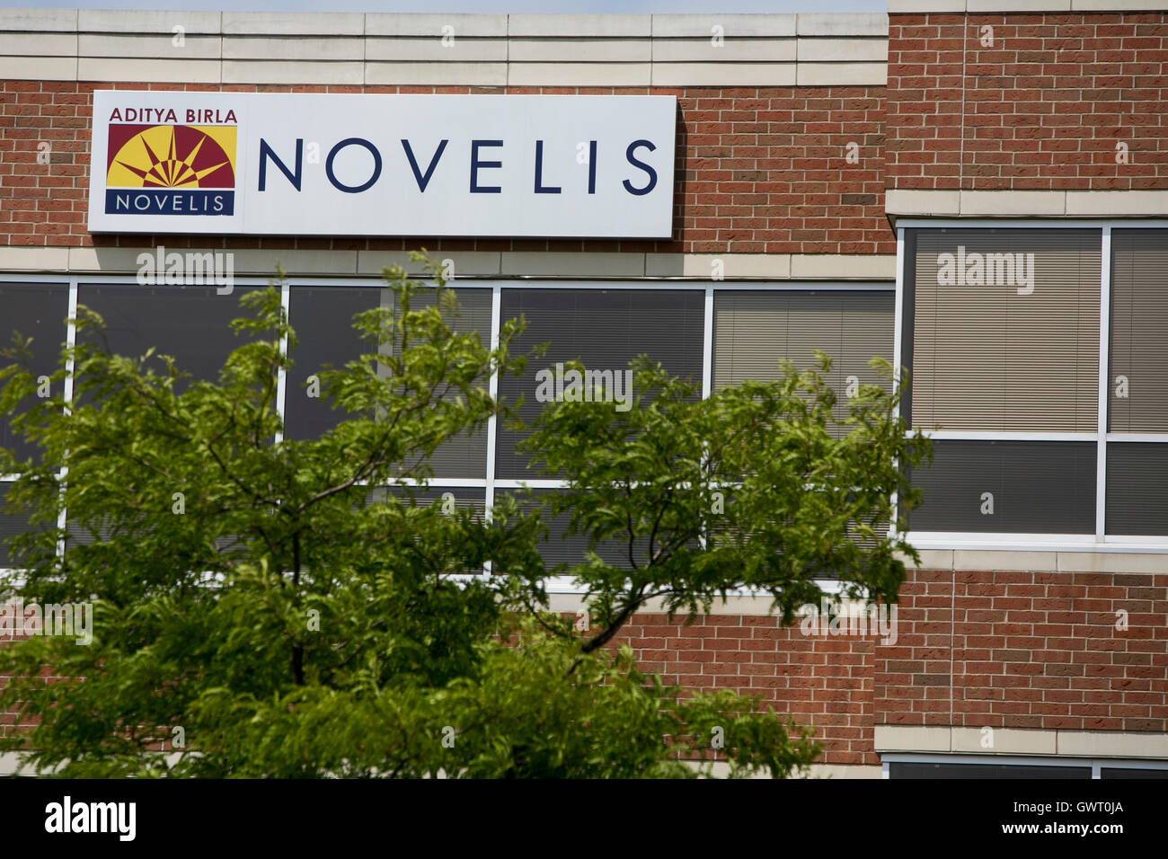 A logo sign outside of a facility occupied by Novelis in Novi, Michigan ...