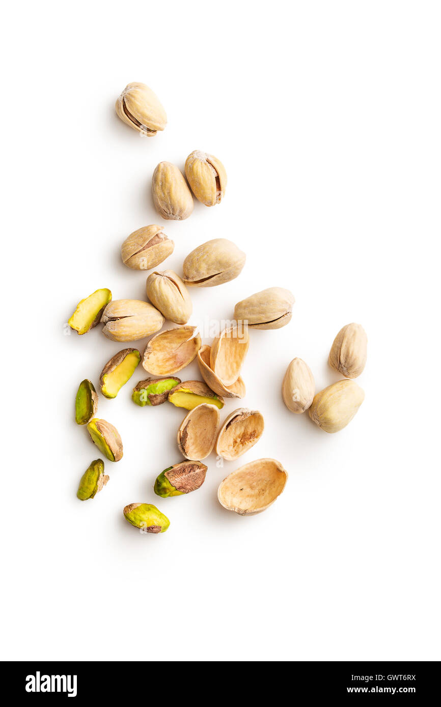 Peeled pistachio nuts isolated on white background. Top view Stock ...