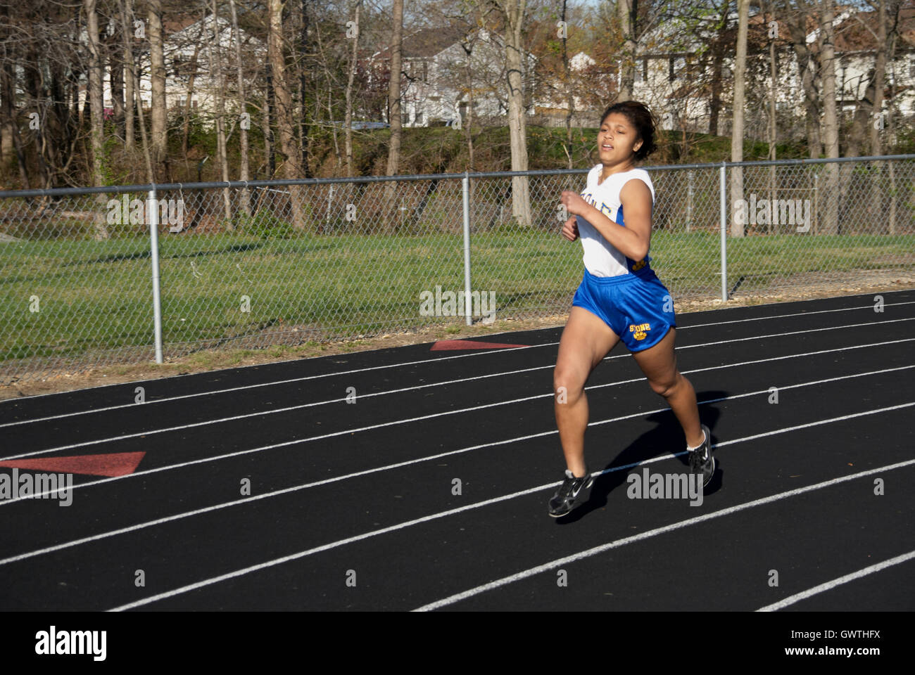 runner in track meet Stock Photo - Alamy