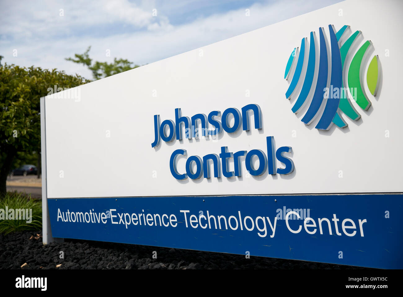 A logo sign outside of a facility occupied by Johnson Controls in ...