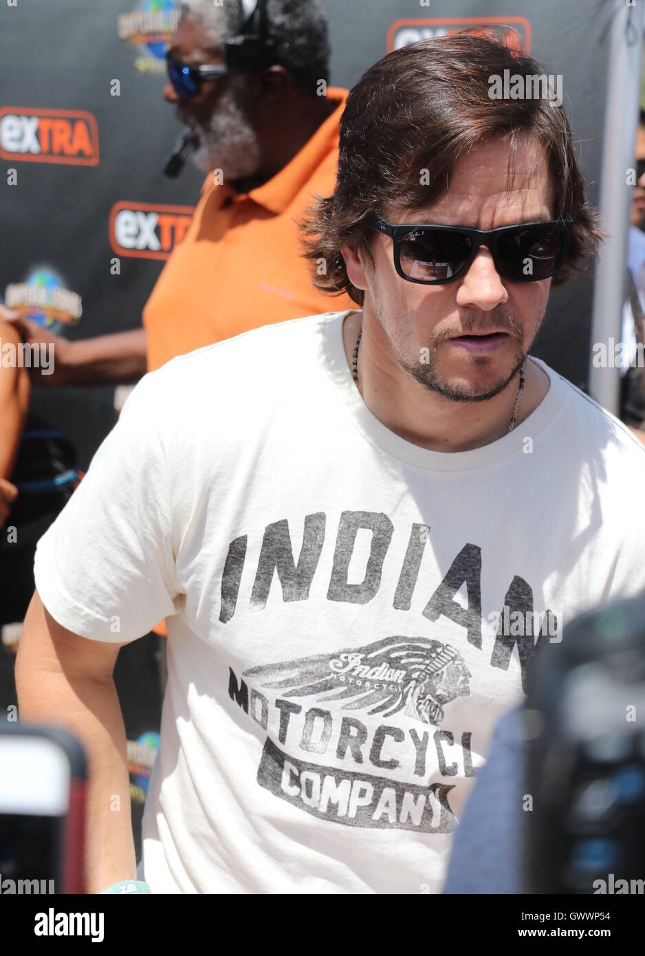 Mark Wahlberg greets fans and signs autographs at Extra in Universal ...