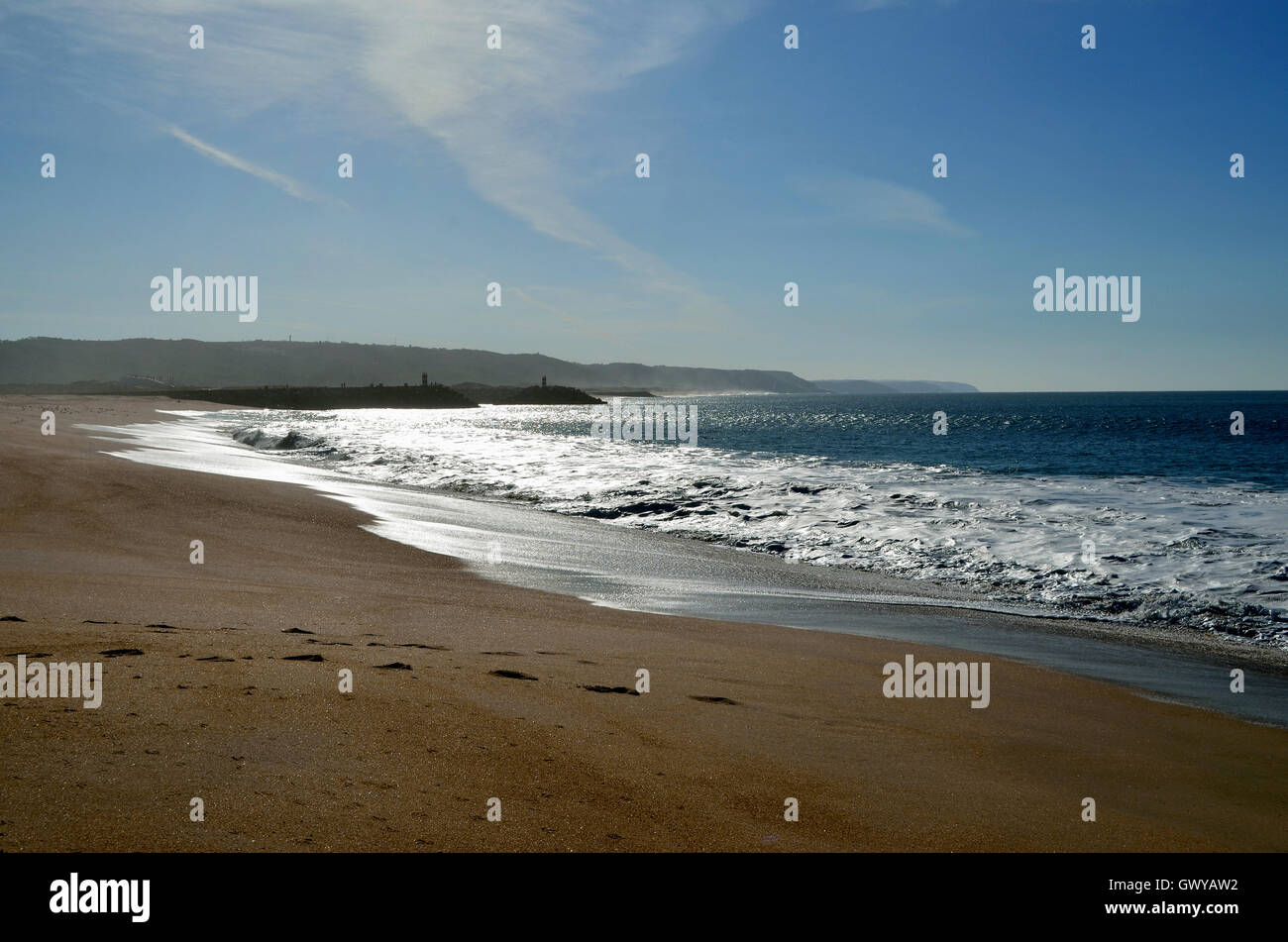 Photo of a uninhabited beach of the Atlantic ocean in small town Nazare ...