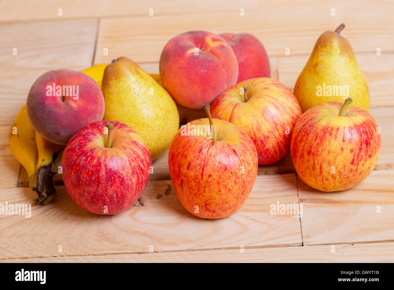 fruits on wooden table, studio picture Stock Photo - Alamy