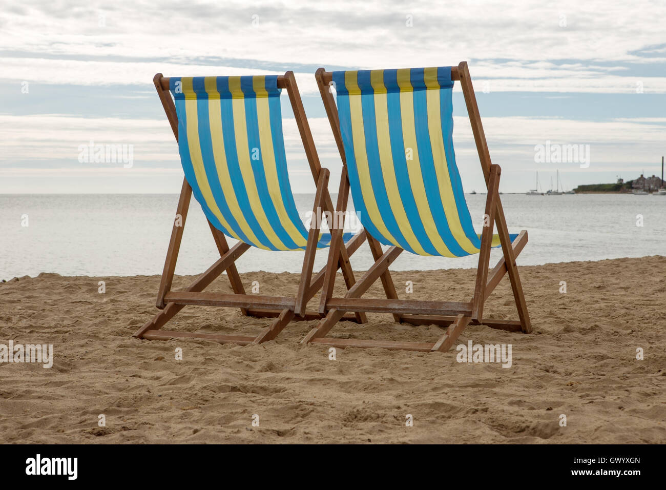 deck chairs set up on swanage beach Stock Photo - Alamy