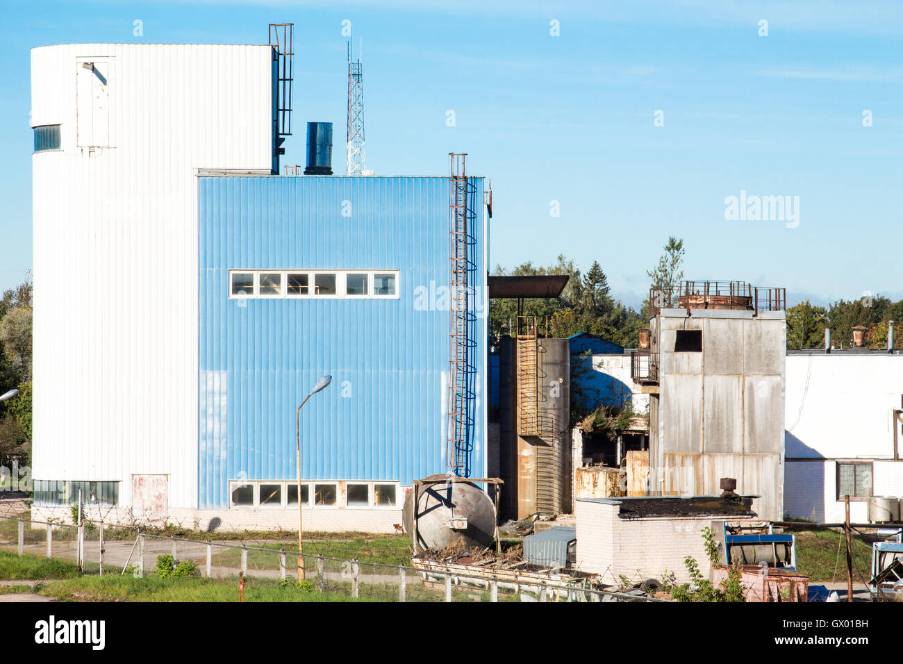 Abandoned old factory with rusty iron constructions Stock Photo - Alamy