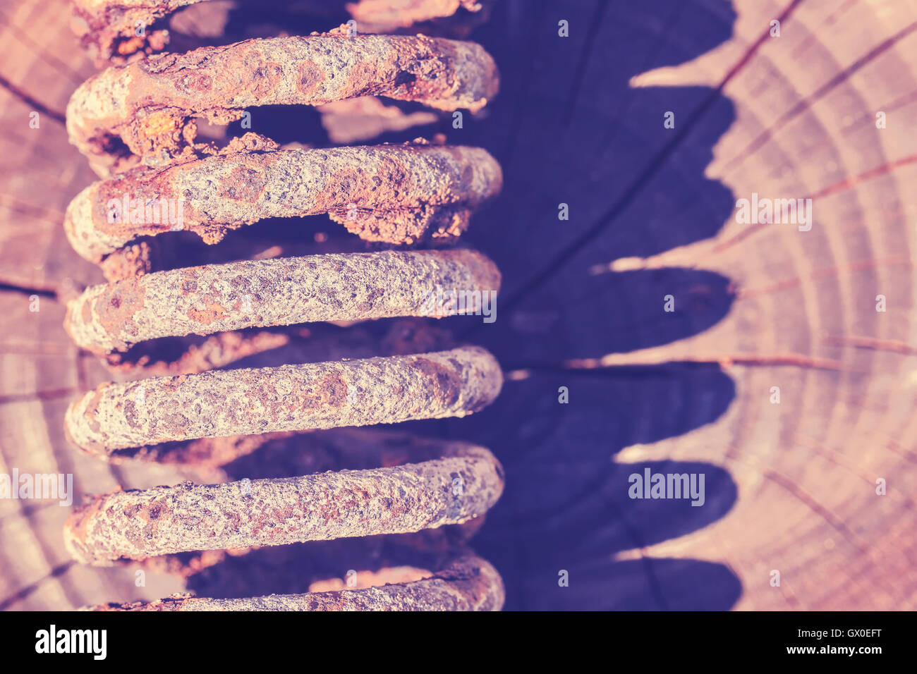 Vintage toned old rusty spring, grunge industrial background, shallow ...