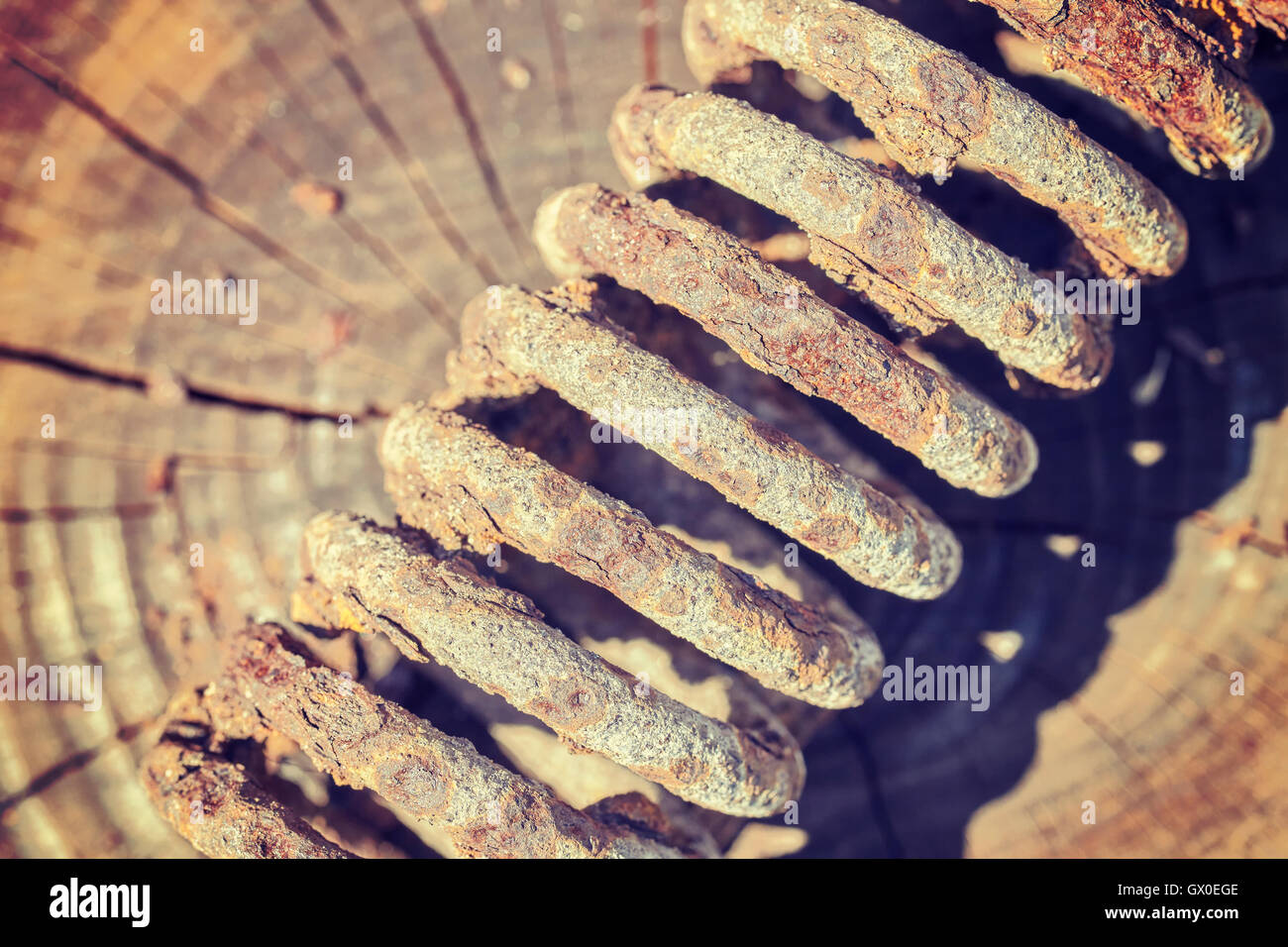 Vintage toned old rusty spring, grunge industrial background, shallow ...