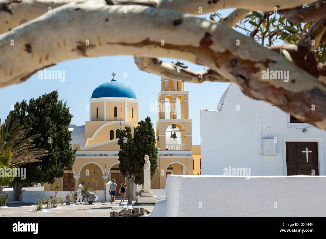 A traditional blue and white coloured Christian building in Oia, on the ...