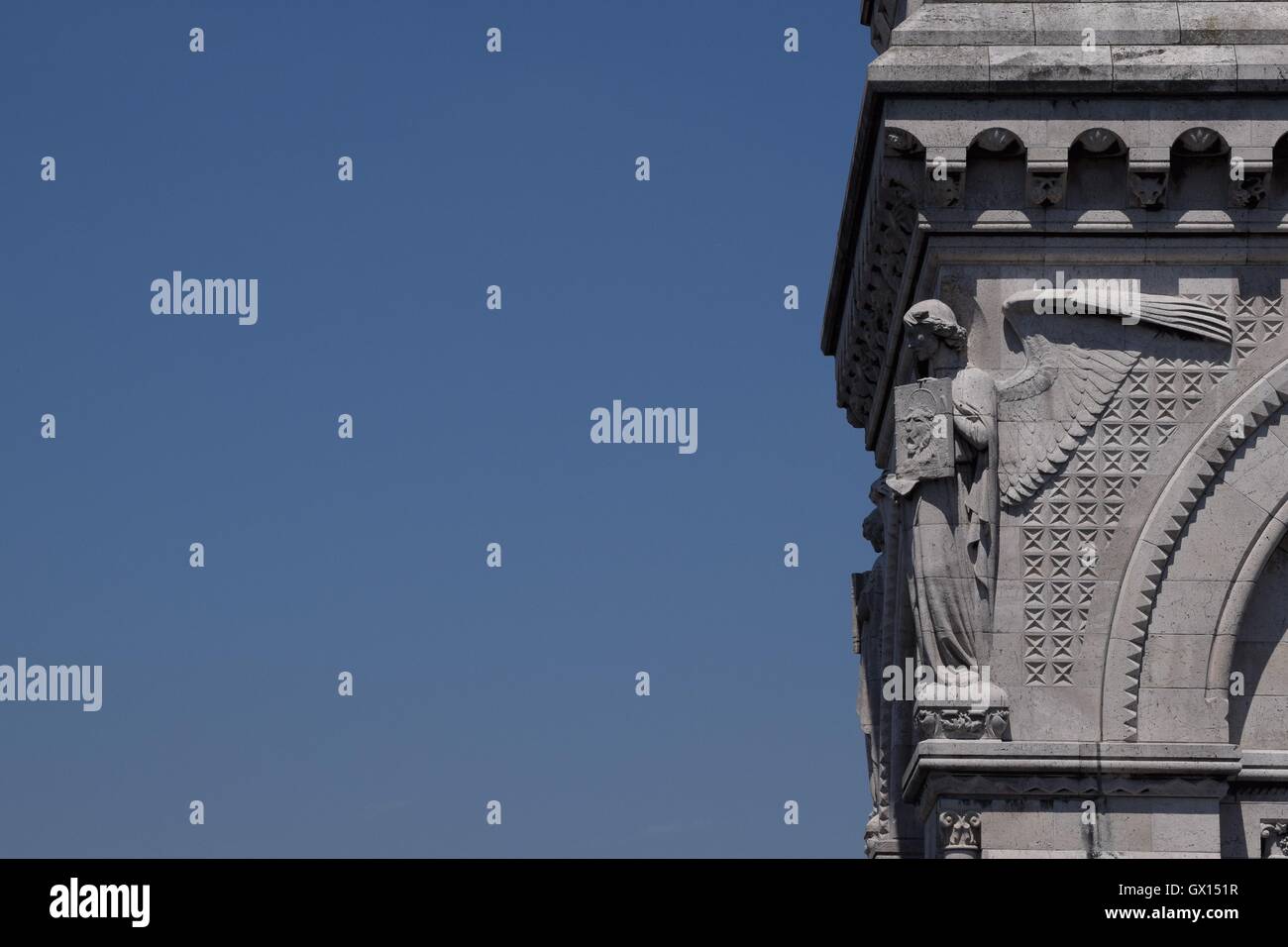 French Cathedral tower featuring an angel Stock Photo - Alamy