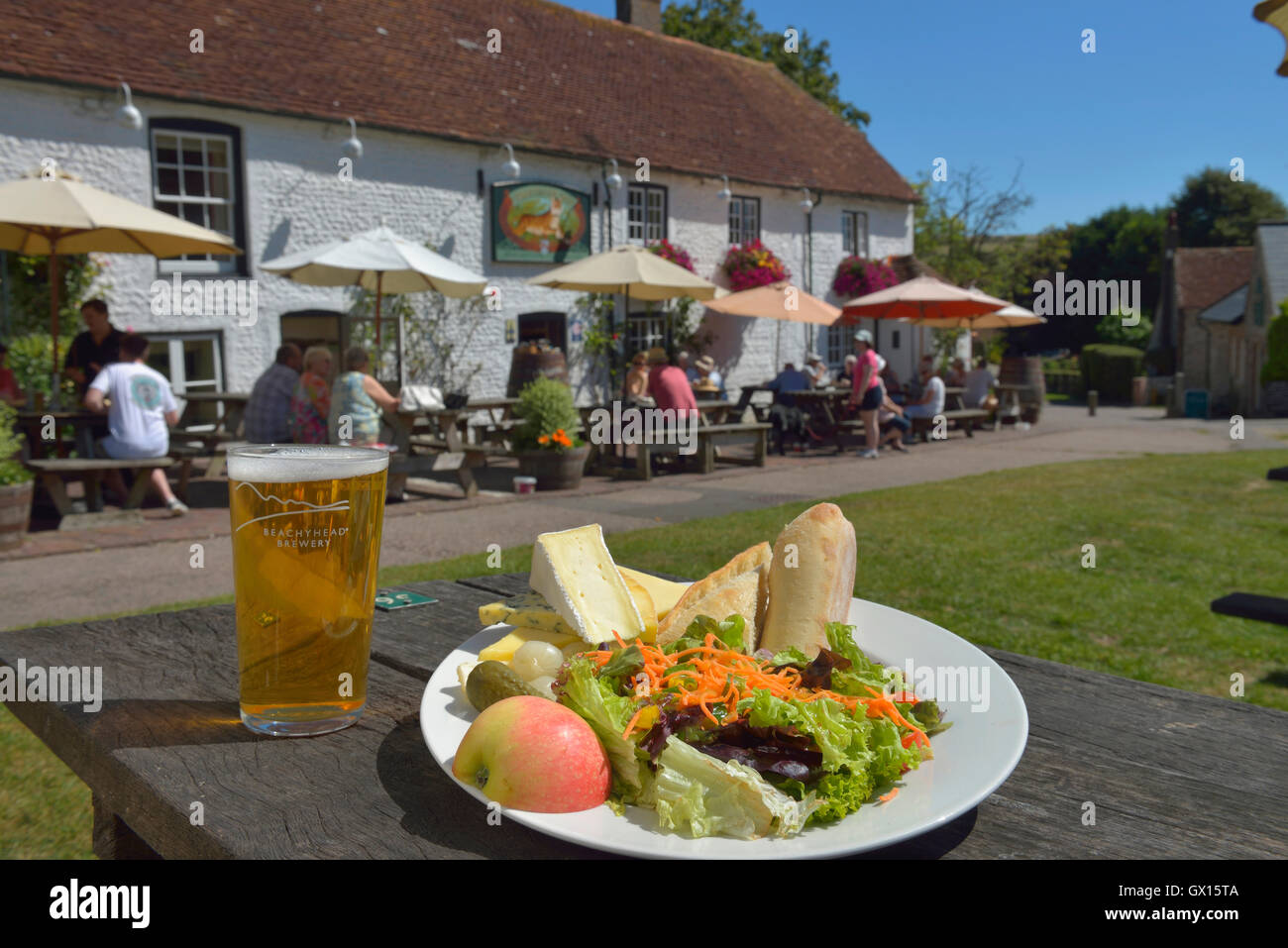 Pub lunch at the Tiger Inn, East Dean, East Sussex, England Stock Photo ...