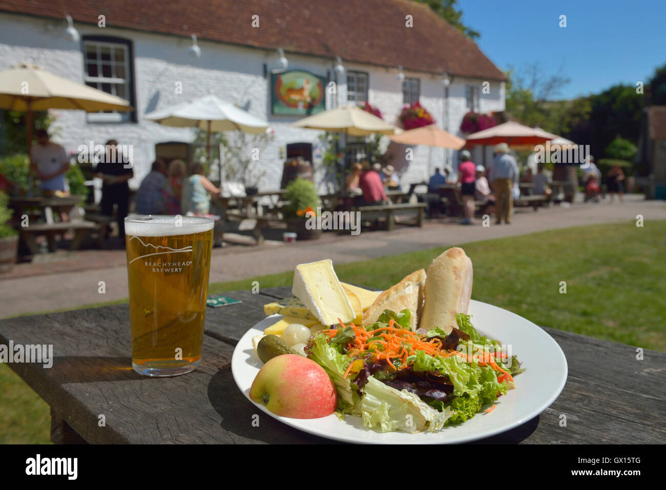 Pub lunch at the Tiger Inn, East Dean, East Sussex, England Stock Photo ...
