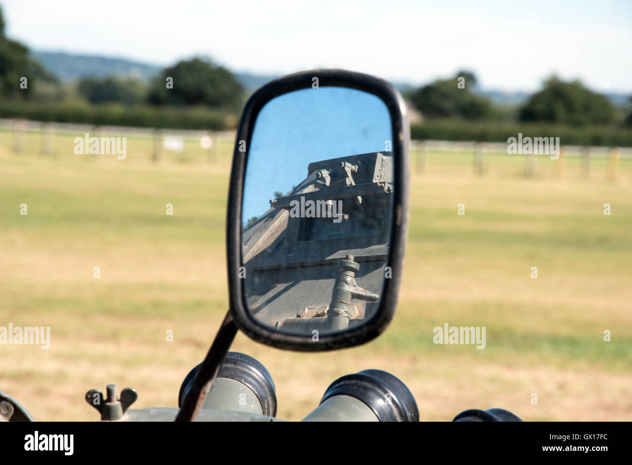 Reflection in the mirror of a military vehicle Stock Photo - Alamy