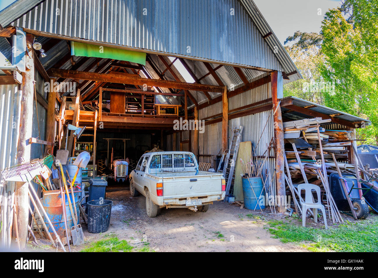 tin farm shed with a ute Stock Photo - Alamy