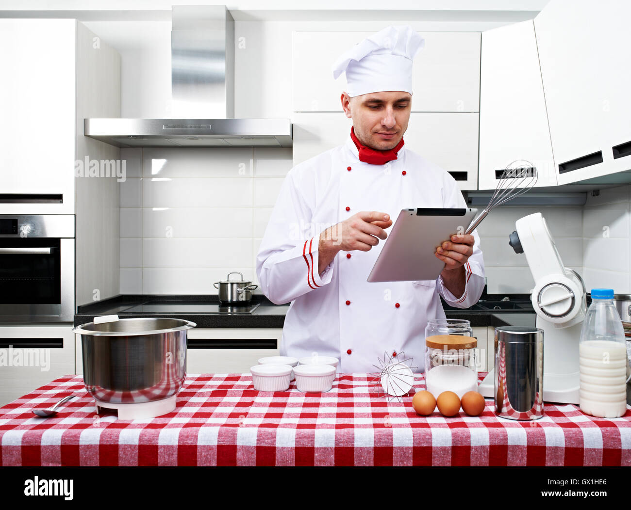 Male chef at kitchen Stock Photo - Alamy