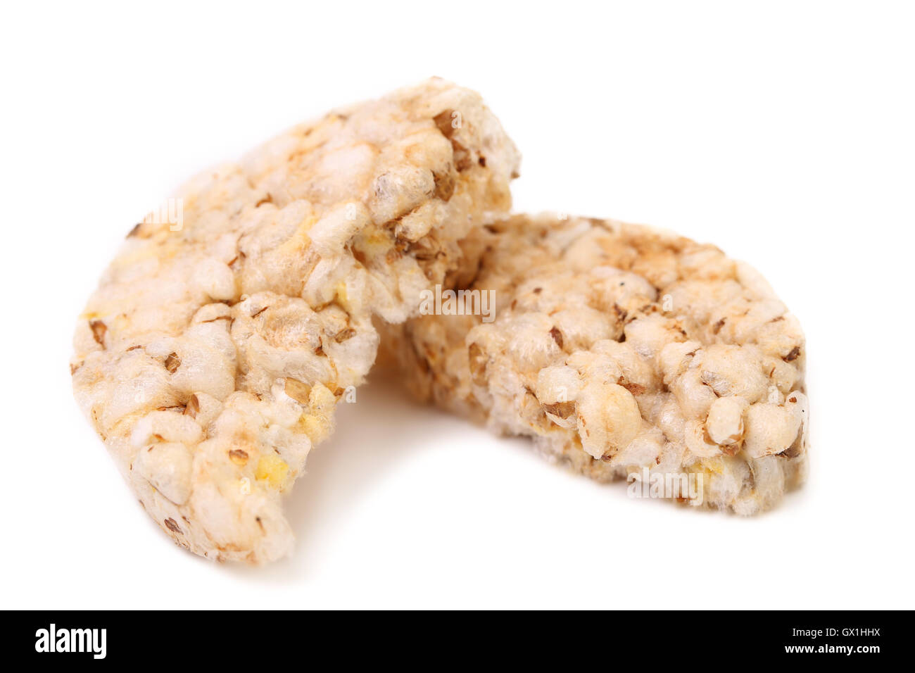 Two halfs of rice cake Stock Photo - Alamy