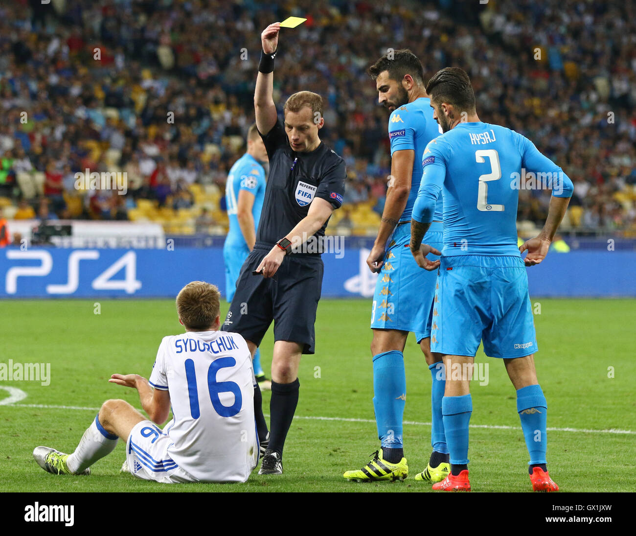 Referee William Collum shows yellow card Stock Photo - Alamy