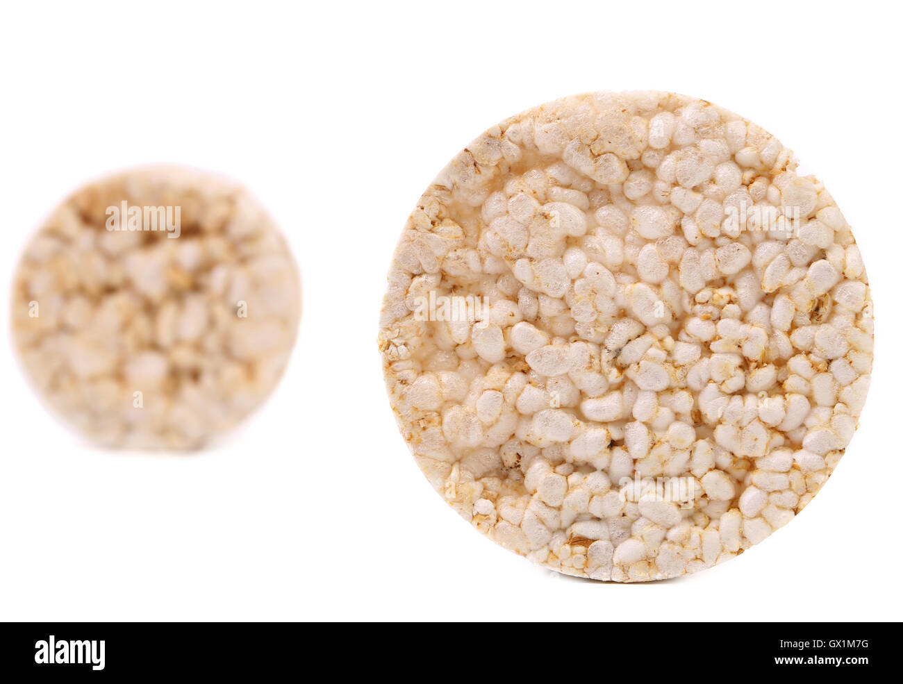 Puffed rice snack on white background Stock Photo - Alamy
