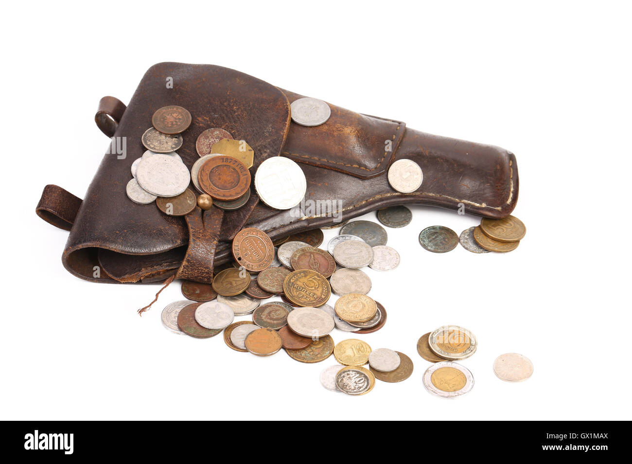 Gun and coins Stock Photo - Alamy