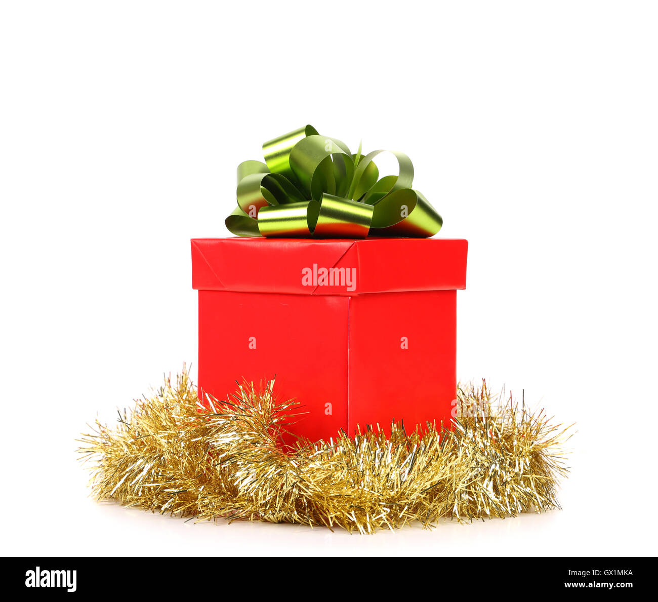 Red gift box with green-golden bow Stock Photo - Alamy