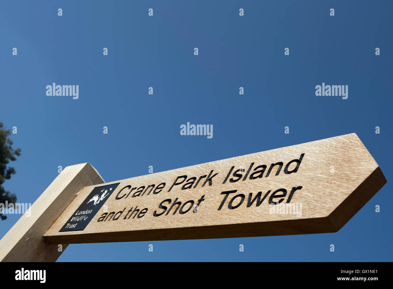 signpost giving directions to crane park island and the shot tower ...