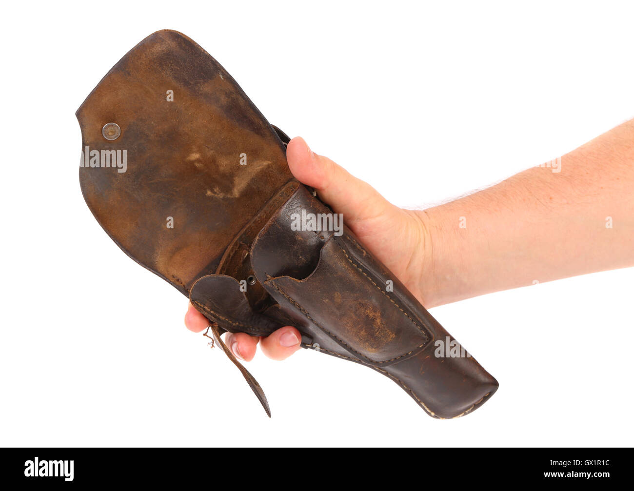 Hand holds old brown holster Stock Photo - Alamy