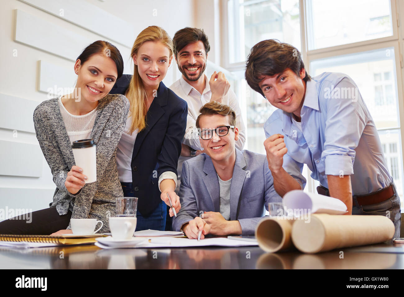 Successful business group in a start-up company Stock Photo - Alamy