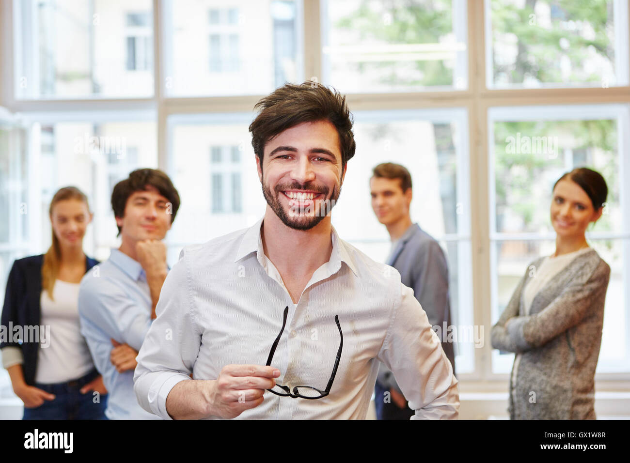 Successful businessman as entrepreneur with competent team Stock Photo ...