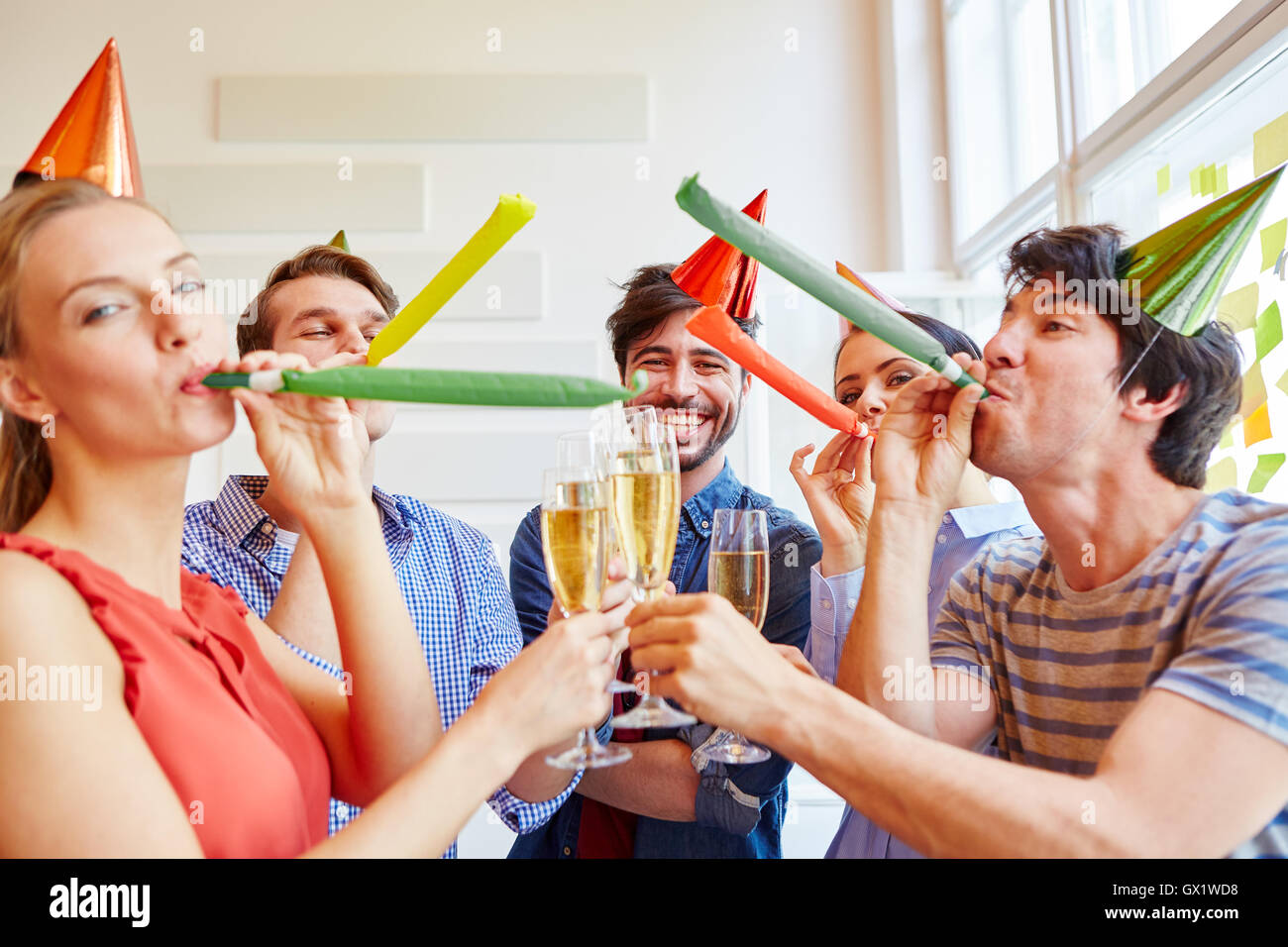 Happy students having a party during a celebration Stock Photo - Alamy