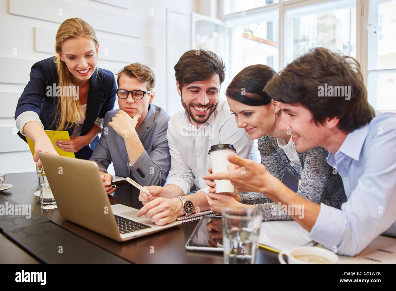 Team in workshop laptop computer hi-res stock photography and images ...