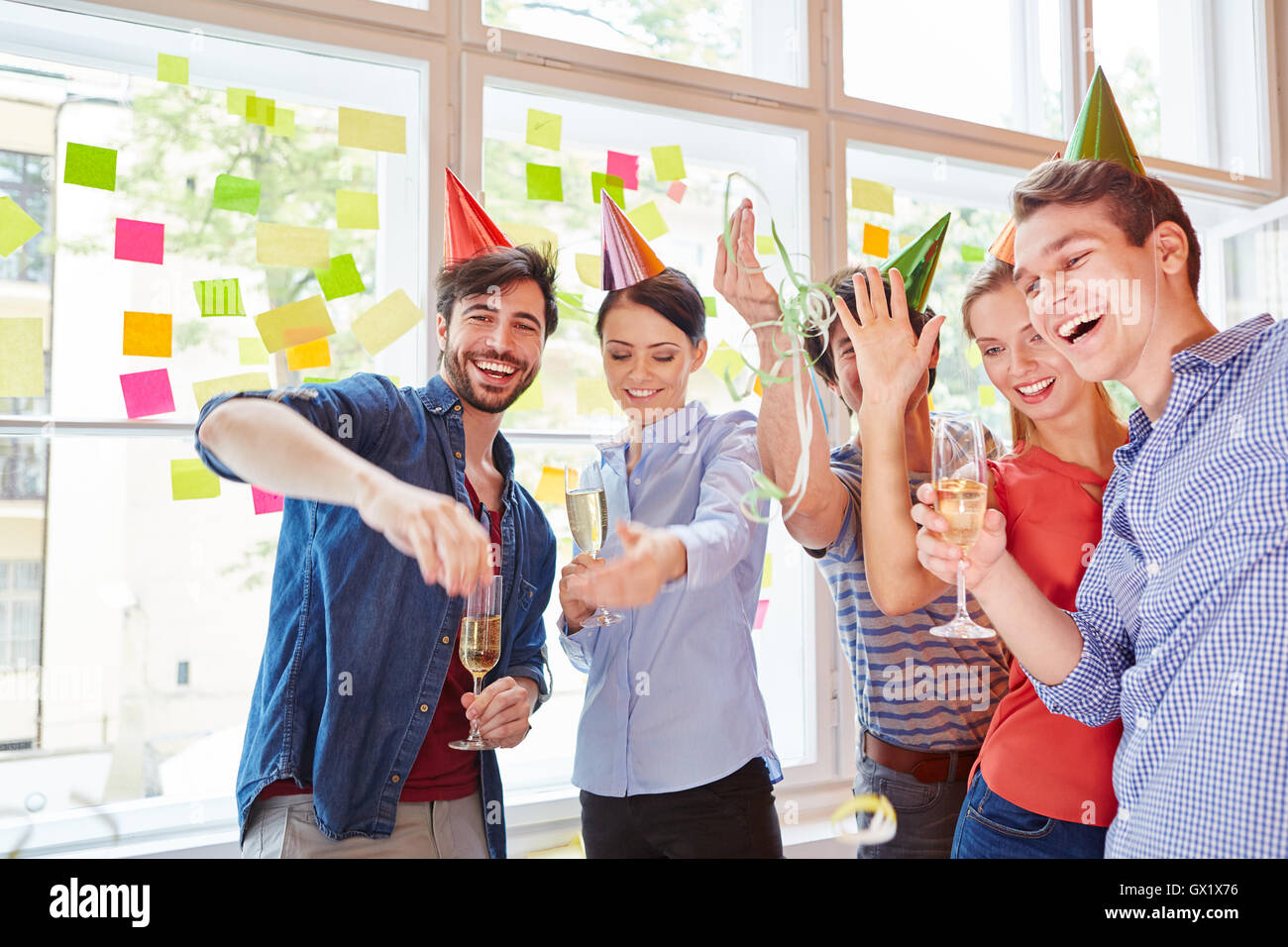 Young people in party with team celebrating their success Stock Photo ...