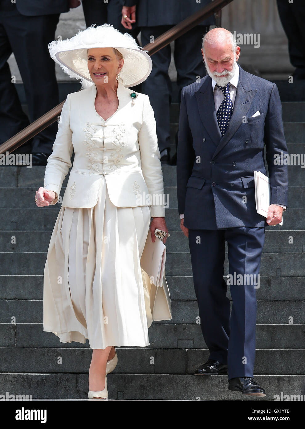 The Queen, accompanied by Prince Philip and other members of the Royal ...